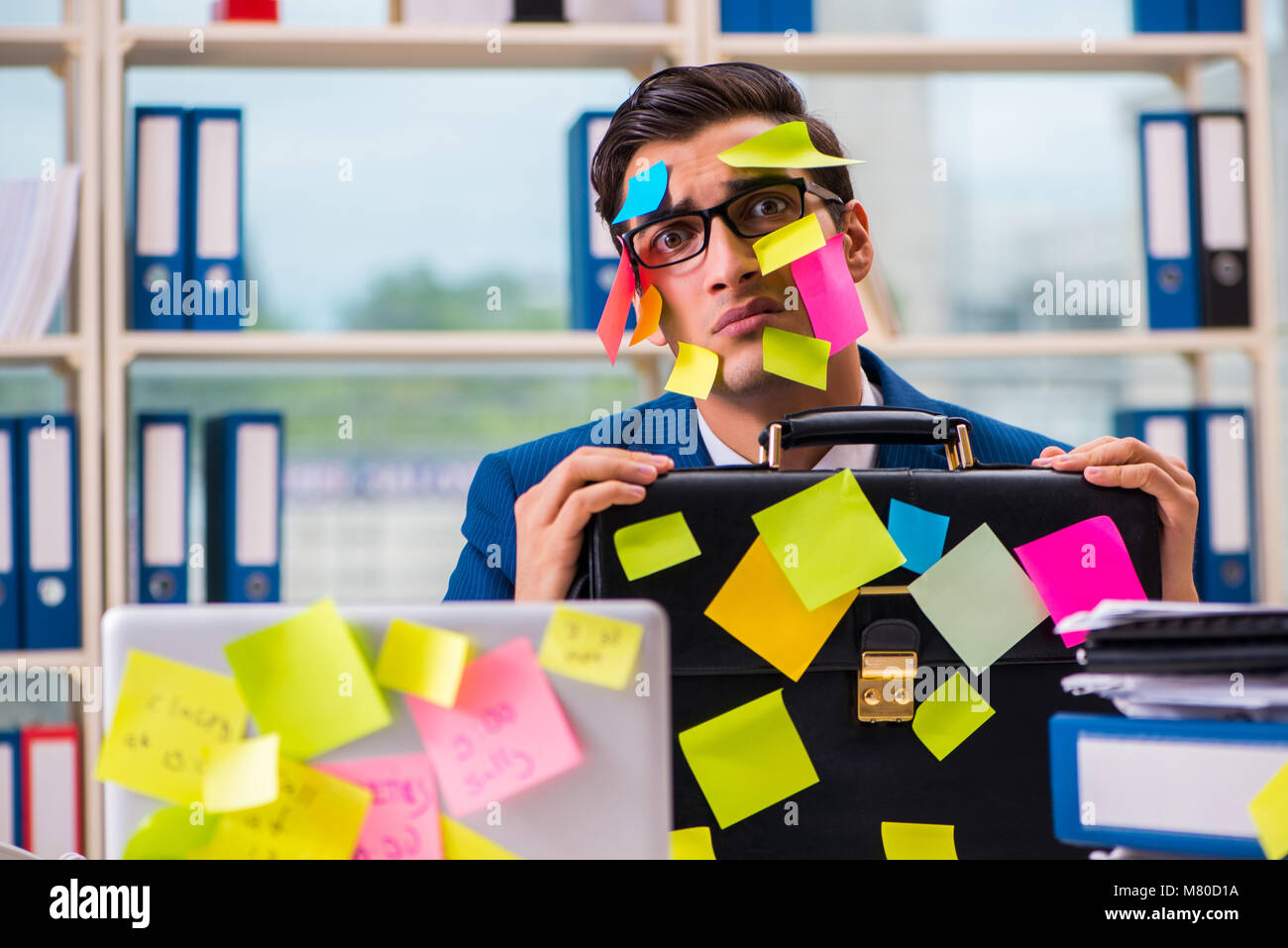 Businessman with reminder notes in multitasking concept Stock Photo - Alamy