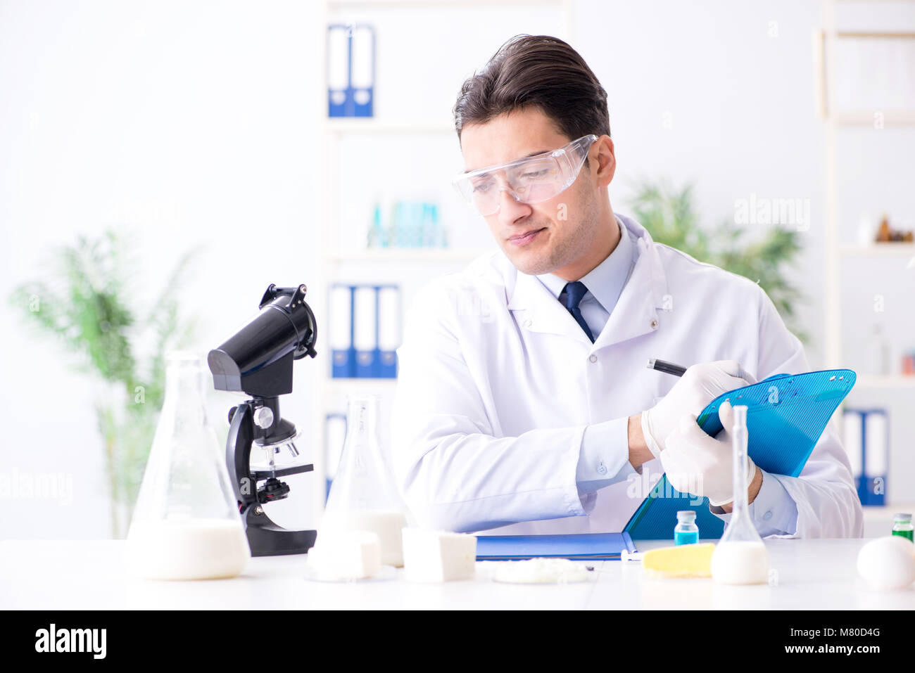 Food scientist testing new stuff in the lab Stock Photo - Alamy