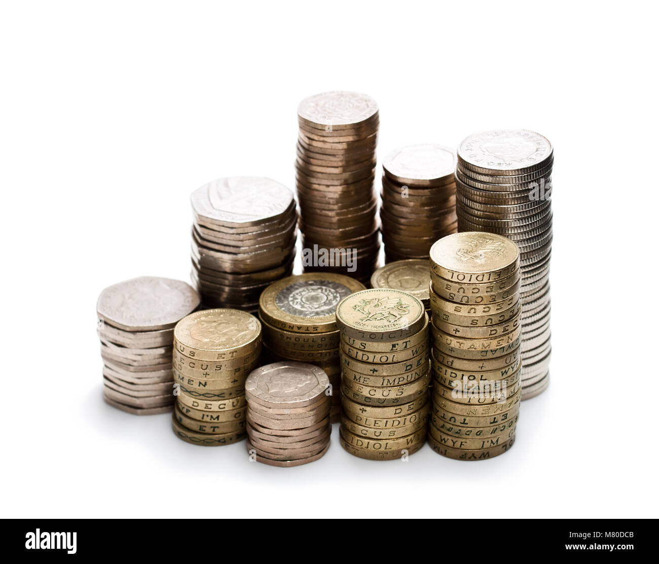 Coin stacks with financial graph Cut Out Stock Images & Pictures - Alamy