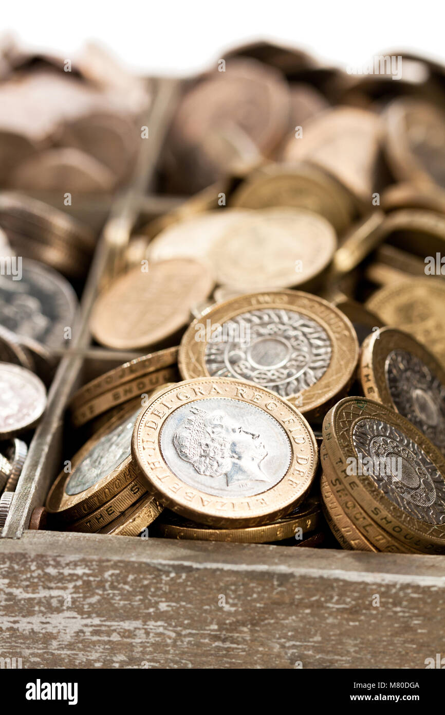 Full of british one pound coins hi-res stock photography and images - Alamy