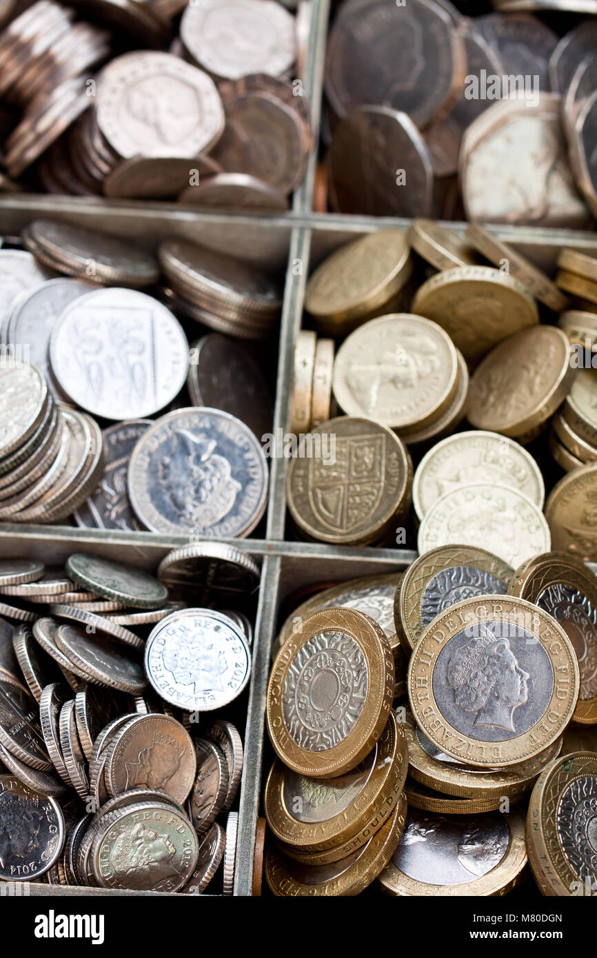 Full of british one pound coins hi-res stock photography and images - Alamy