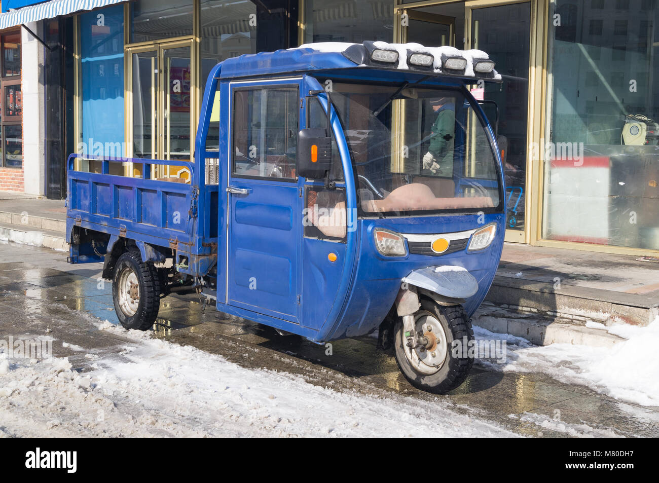 Delivery motorcycle with cab hi-res stock photography and images - Alamy