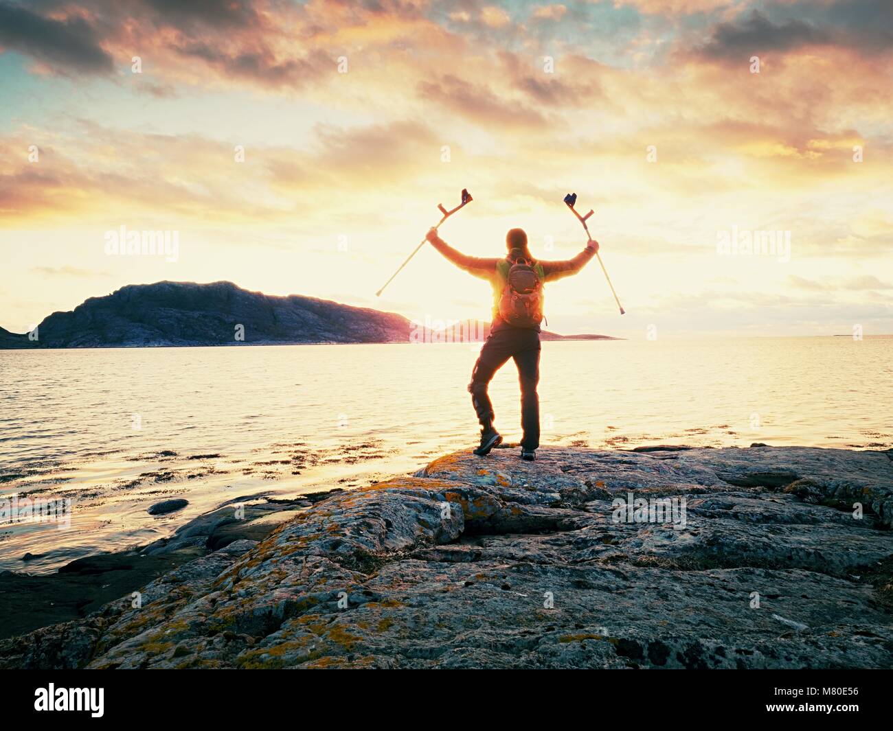 Disabled hurt hiker man is celebrate alone attachment of his target ...