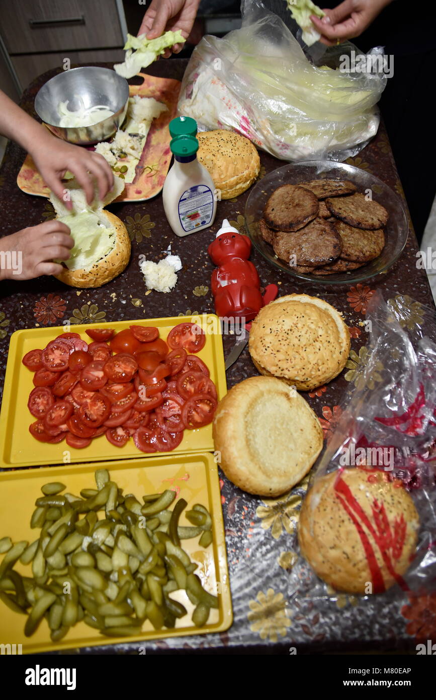 Making Hamburger Sandwich at home Stock Photo - Alamy