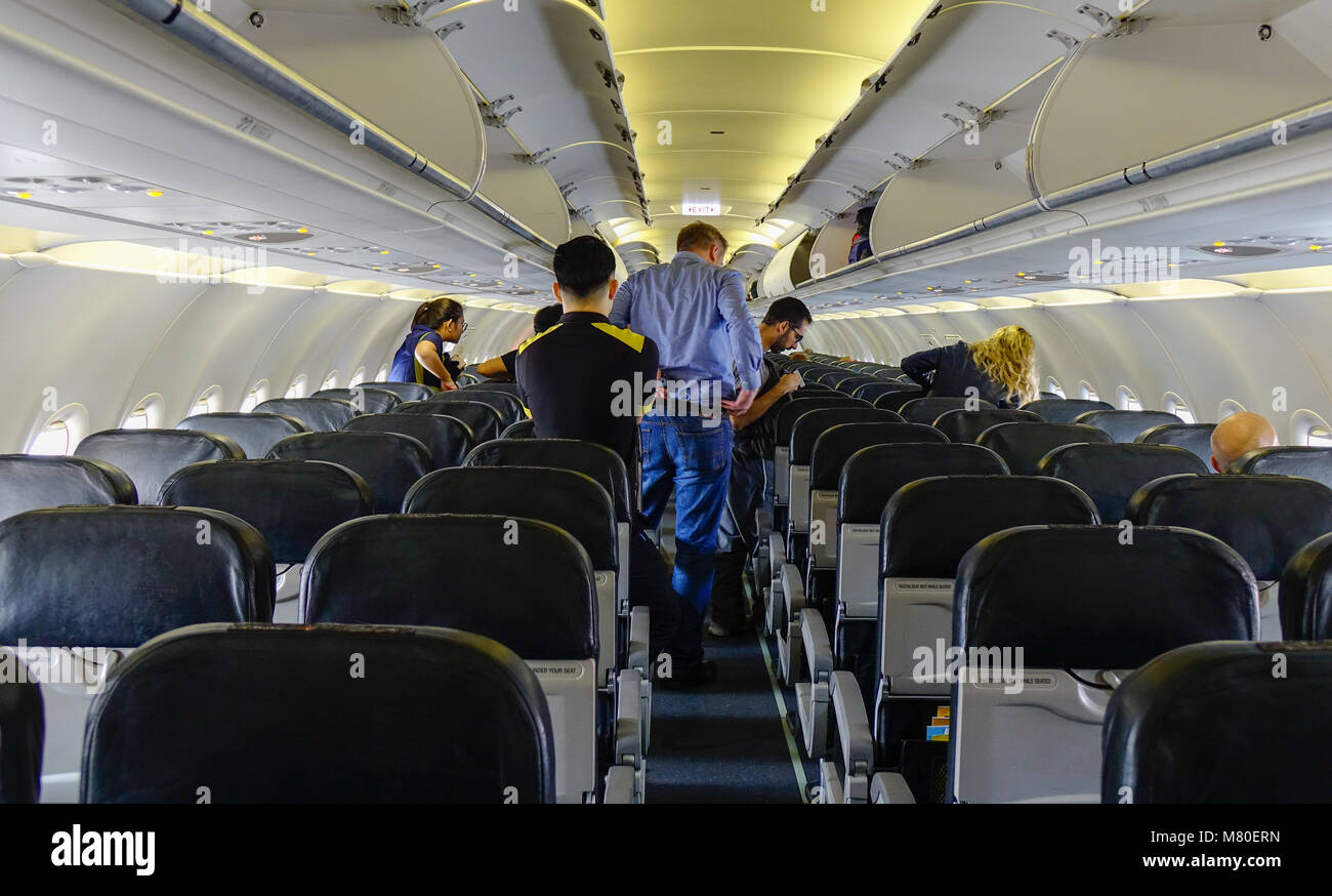 Airplane standing seats hi-res stock photography and images - Alamy