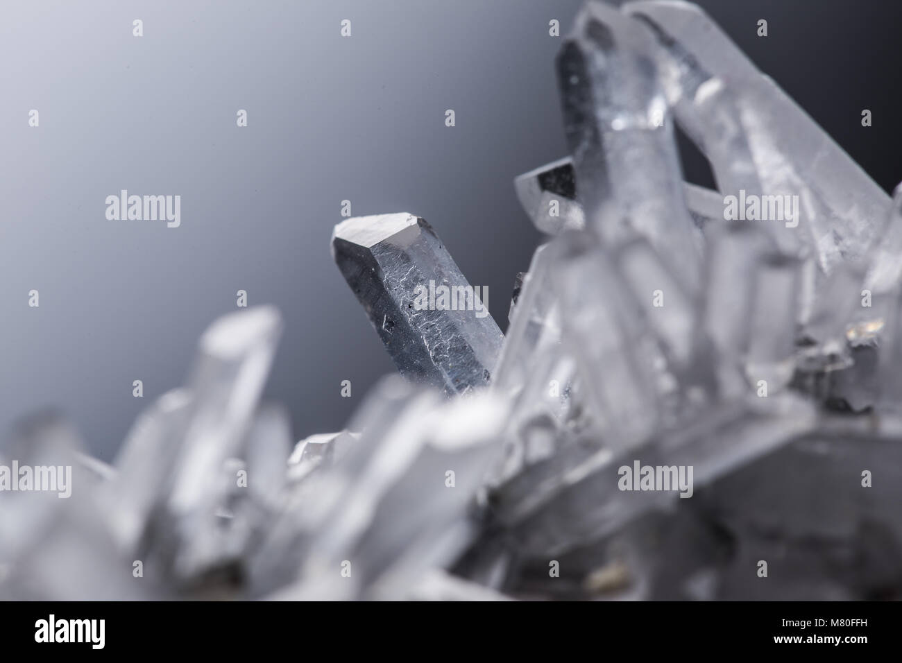 Pure Quartz Crystal cluster on black background Stock Photo - Alamy