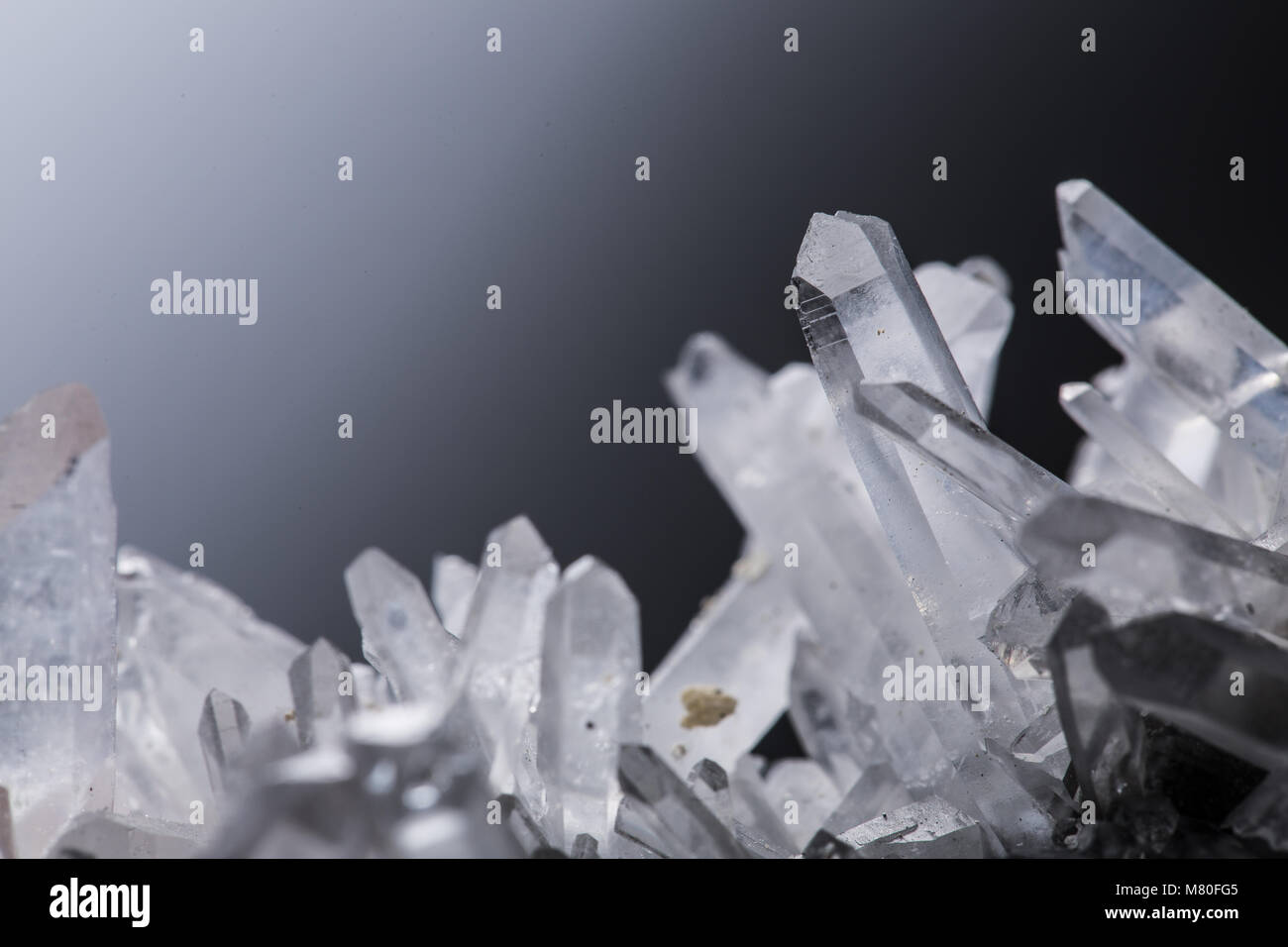 Pure Quartz Crystal cluster on black background Stock Photo - Alamy