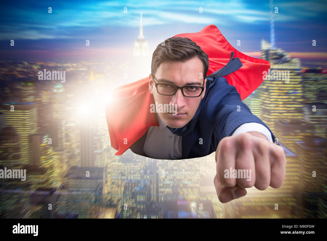 Flying super hero over the city Stock Photo - Alamy