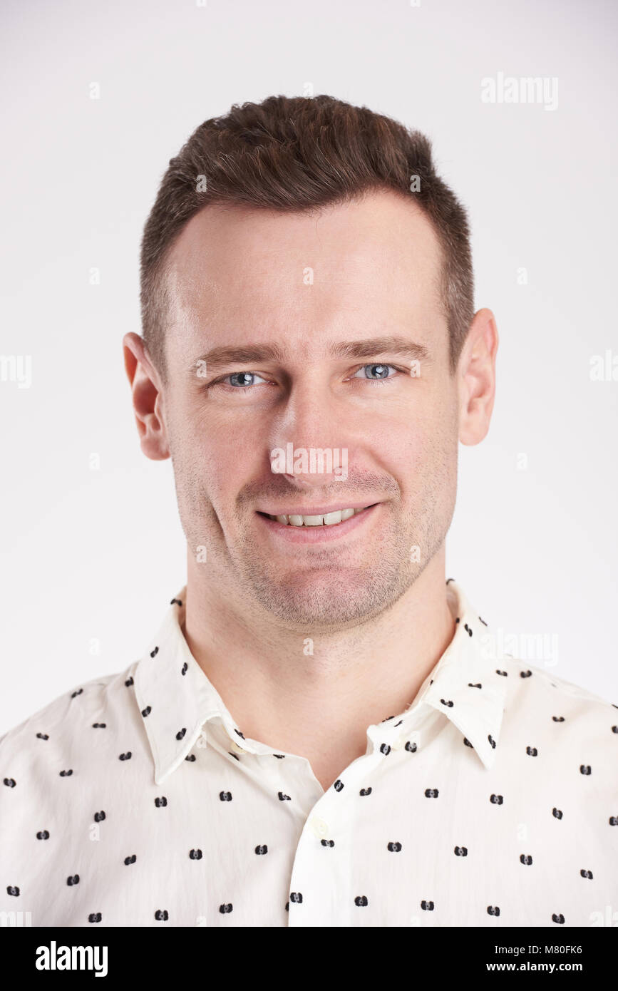 Passport portrait of young caucasian man isolated on white background ...