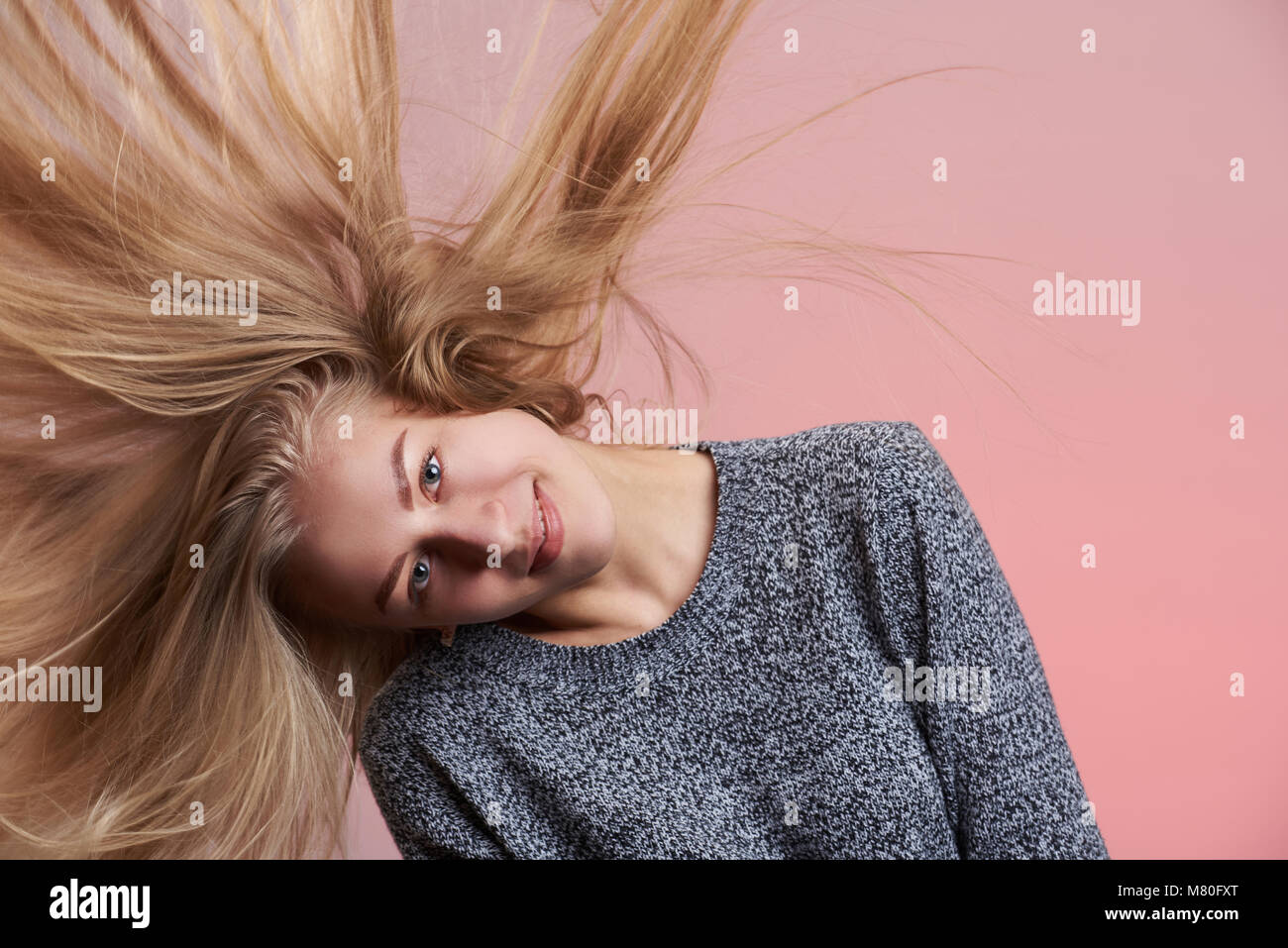 Girl shaking her hair hi-res stock photography and images - Alamy