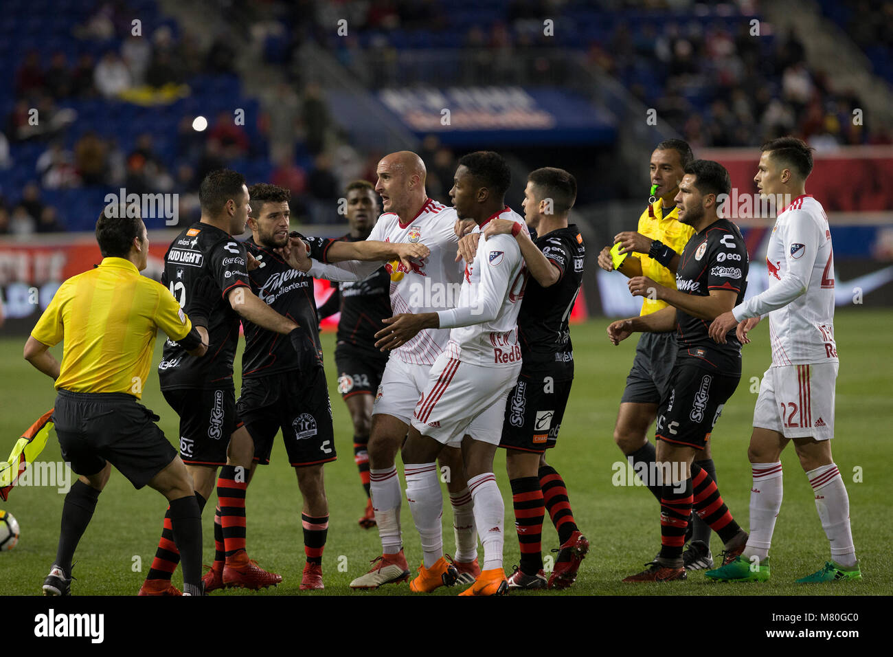 Aurelien Collin (78) of Red Bulls & Pablo Aguilar (12) of Club Tijuana ...