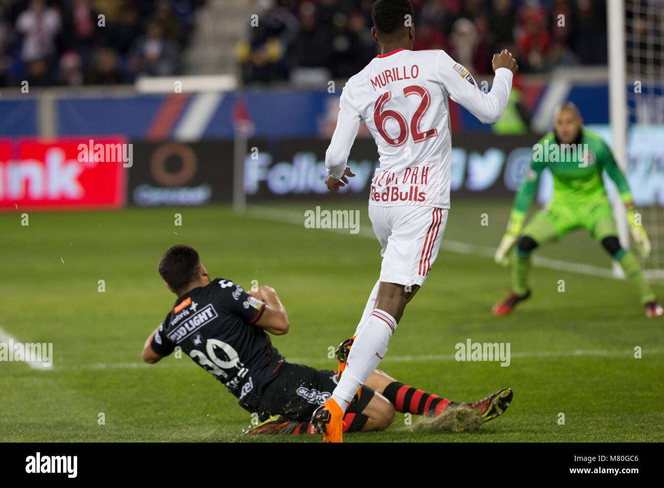 Michael Murillo (62) of Red Bulls & Hiram Munoz (30) of Club Tijuana ...