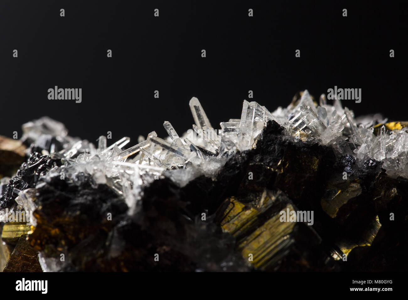 Pure Quartz Crystal cluster on black background Stock Photo - Alamy