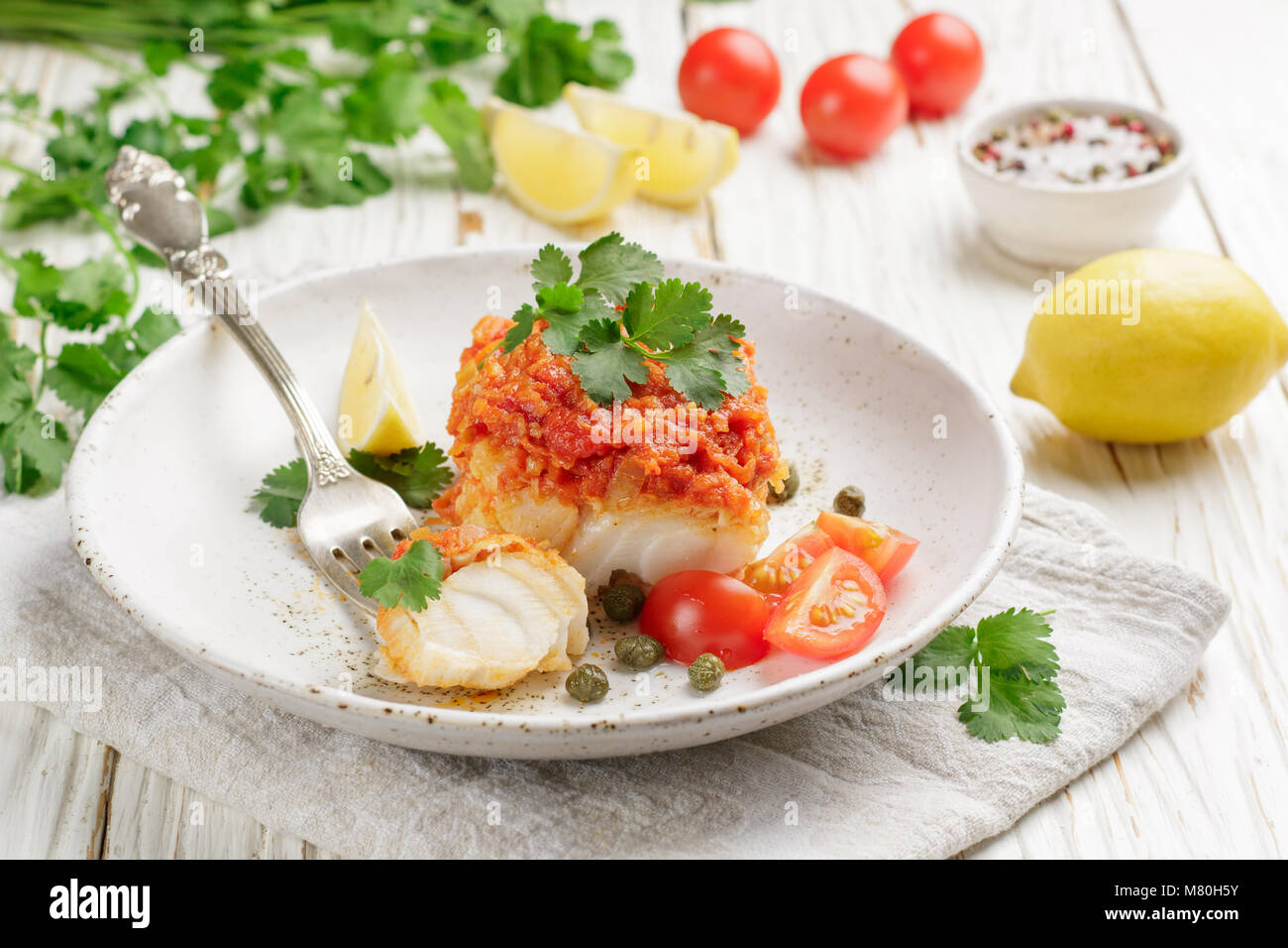 White fish (cod, Pollock, nototenia, hake), braised with onions ...