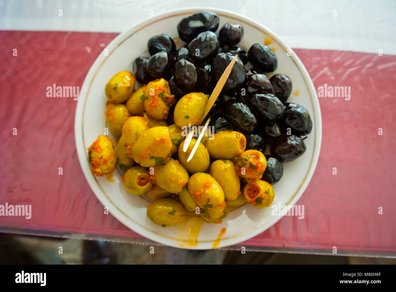 Locally produced, marinated green and black olives, Marrakesh, Morocco ...