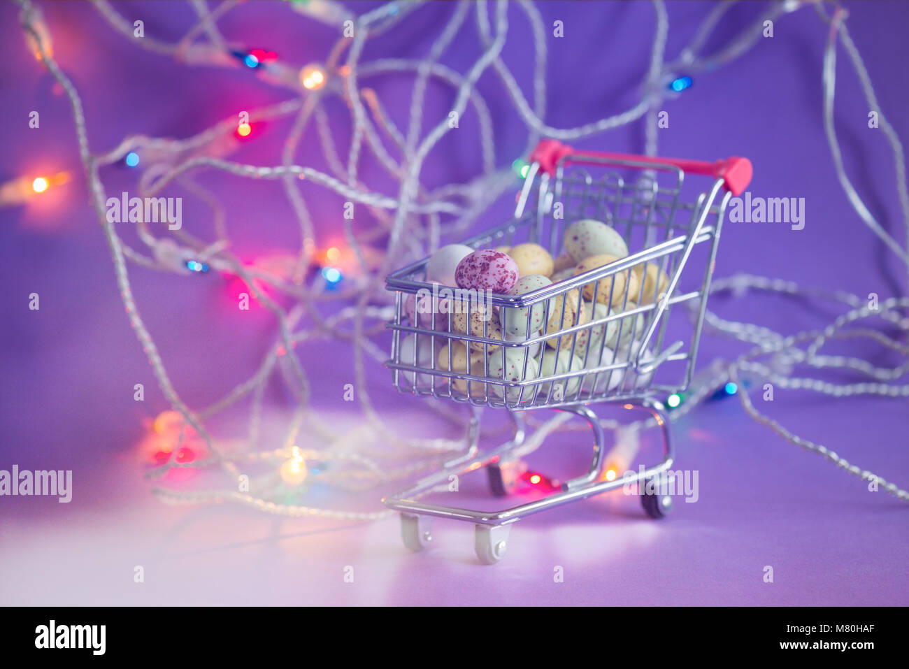Easter eggs in a shopping trolley Stock Photo - Alamy