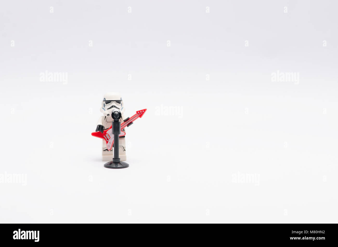 lego storm trooper with guitar and microphone. isolated on white ...