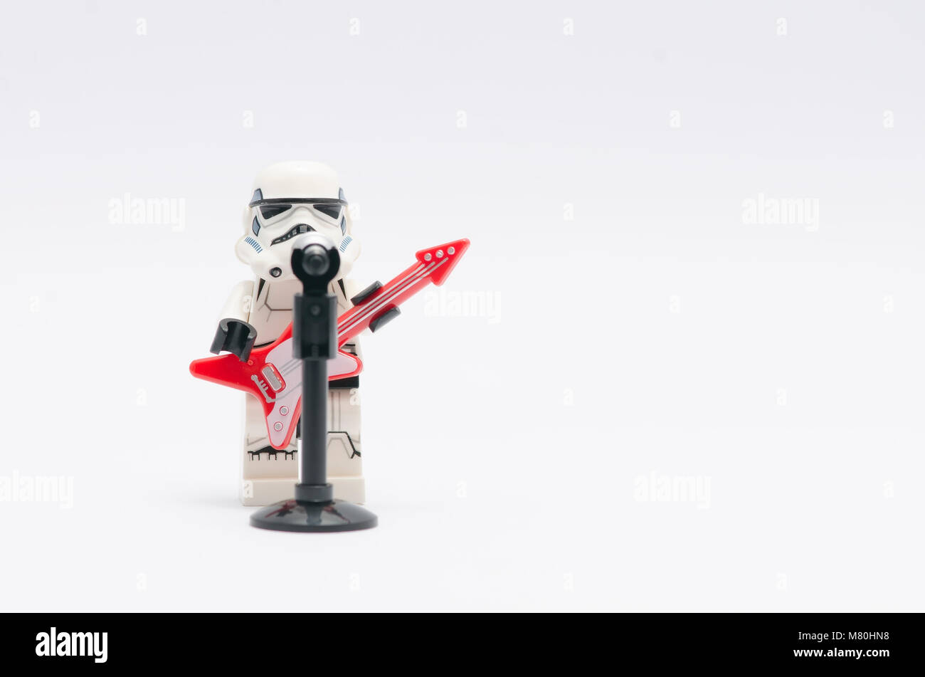 lego storm trooper with guitar and microphone. isolated on white ...