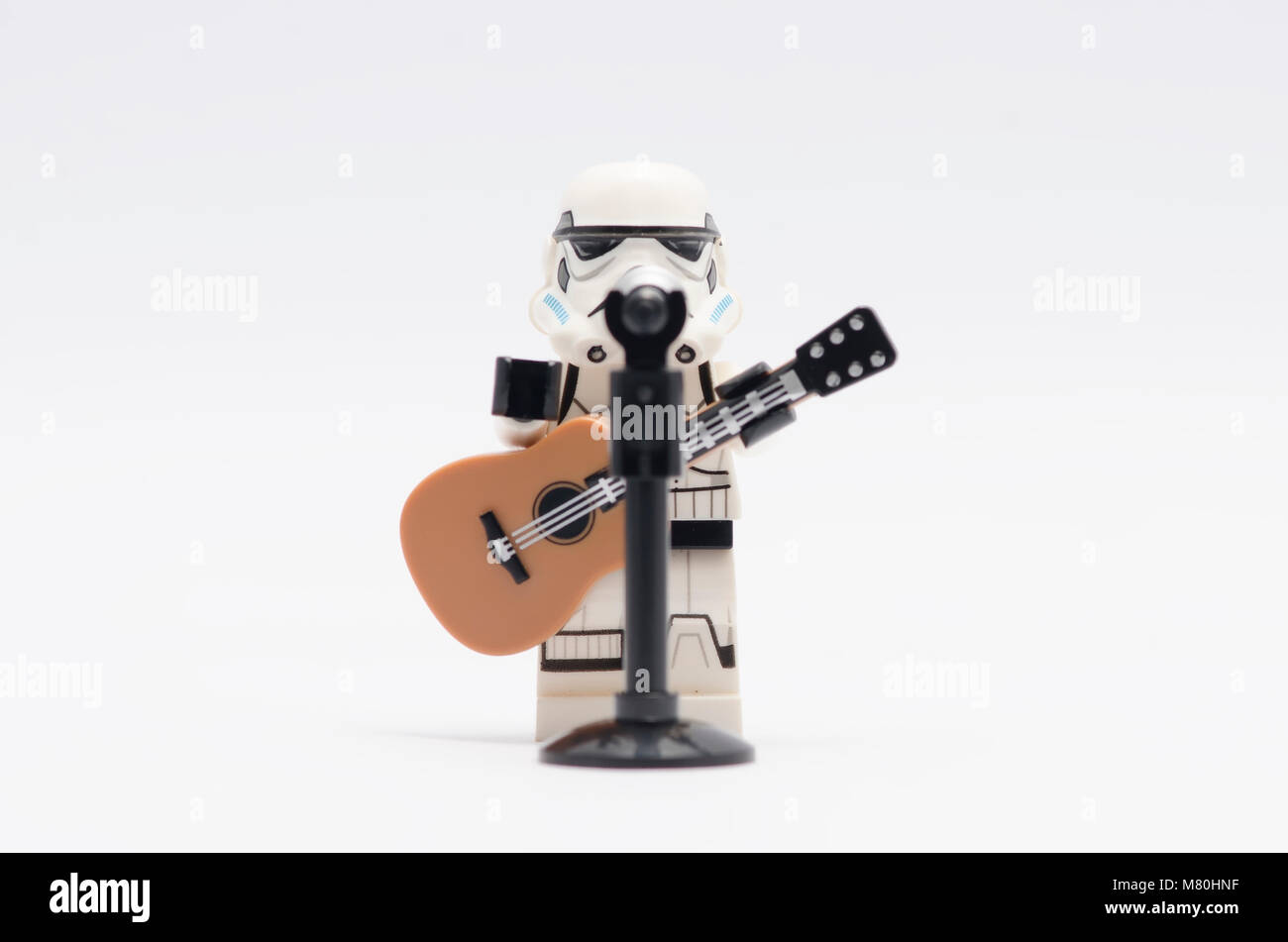 lego storm trooper with guitar and microphone, isolated on white ...