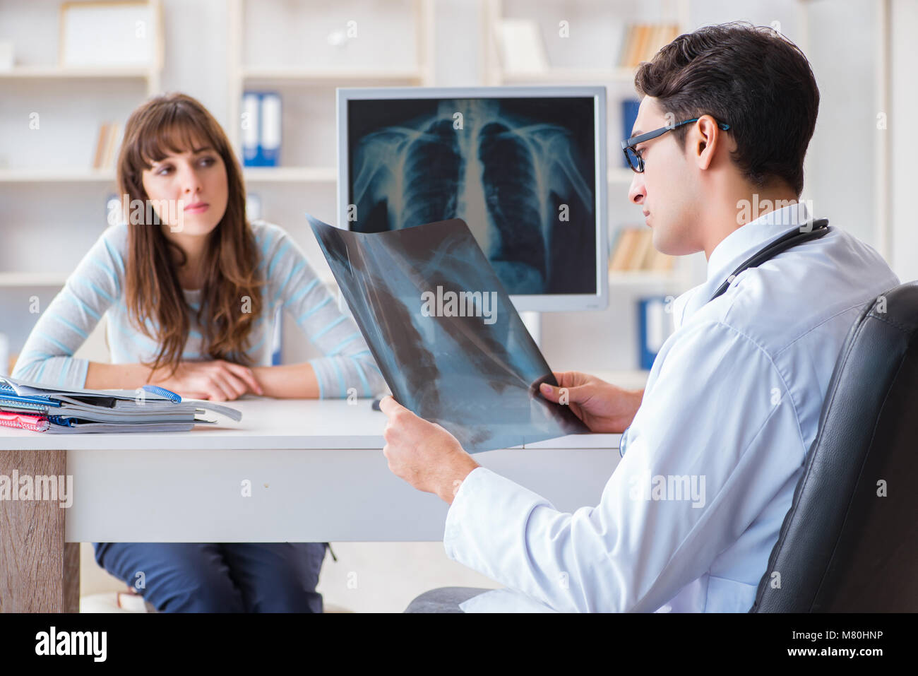 Young woman visiting radiologist for x-ray exam Stock Photo - Alamy