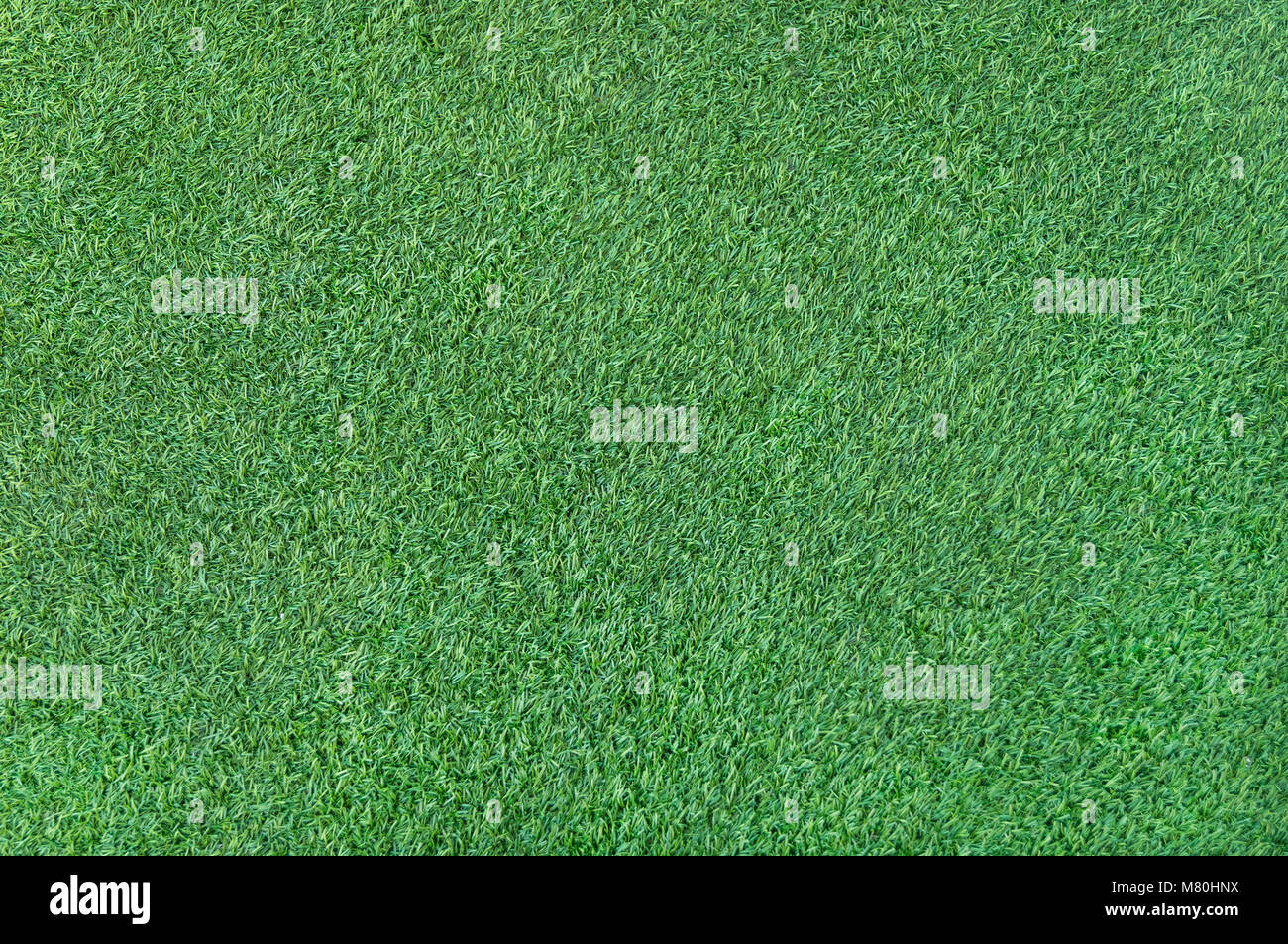Artificial grass background Stock Photo - Alamy