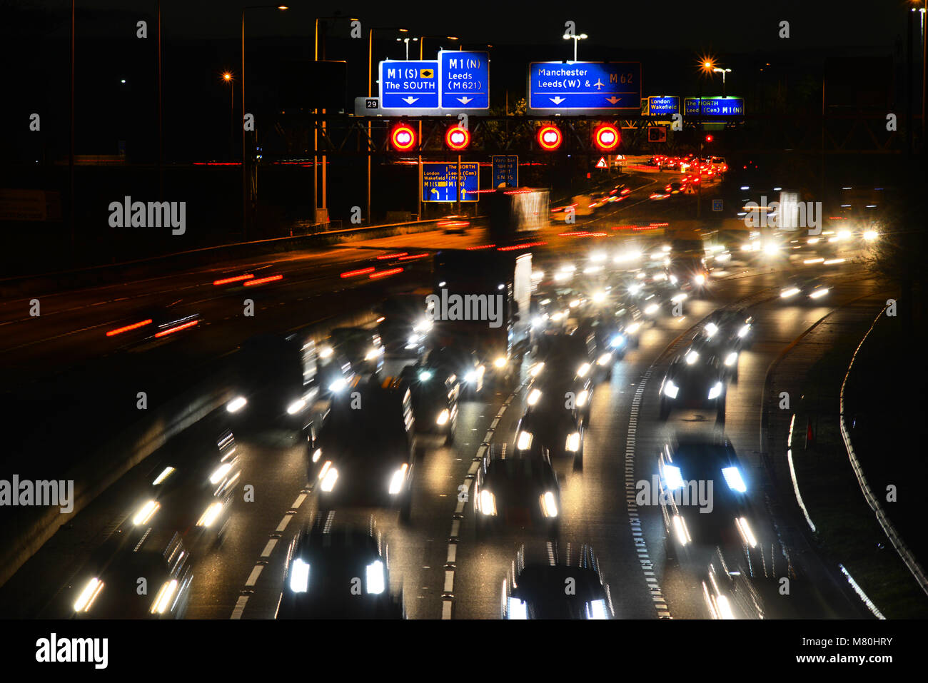 traffic jam by reduced speed limit and speed camera warning signs and ...