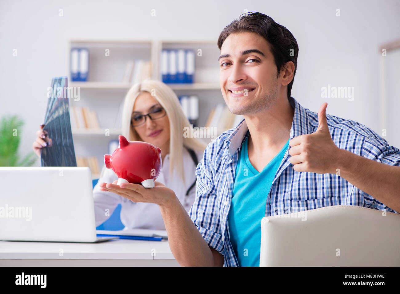 Male patient angry at expensive healthcare bill Stock Photo - Alamy