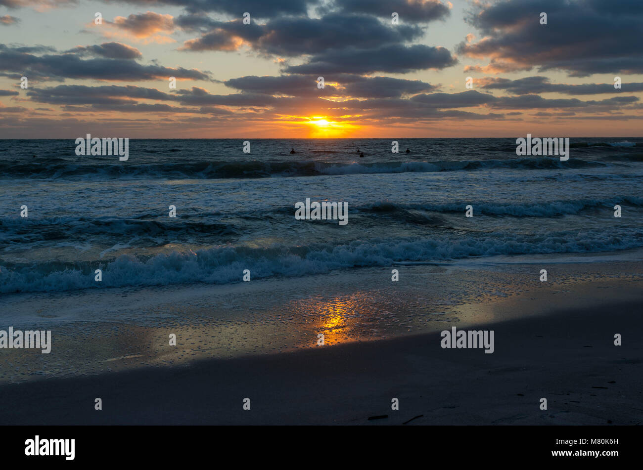 Golden sunset sand key beach hi-res stock photography and images - Alamy