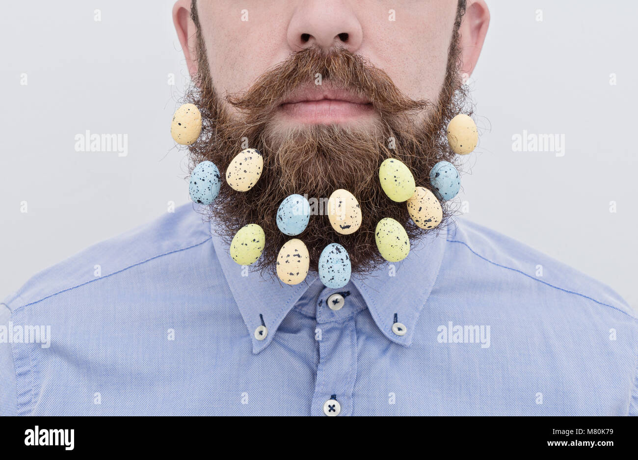 Close up of handsome bearded man with Easter eggs Stock Photo - Alamy