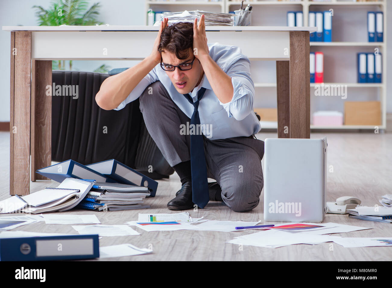 Bankrupt businessman angry in the office floor Stock Photo - Alamy