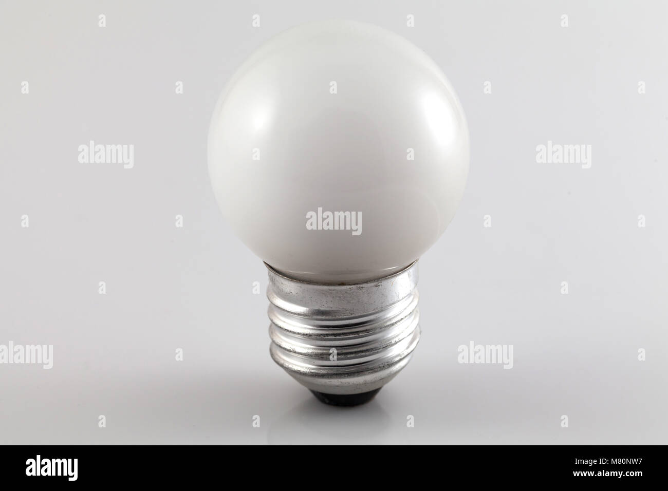 White lightbulb on a white background Stock Photo - Alamy