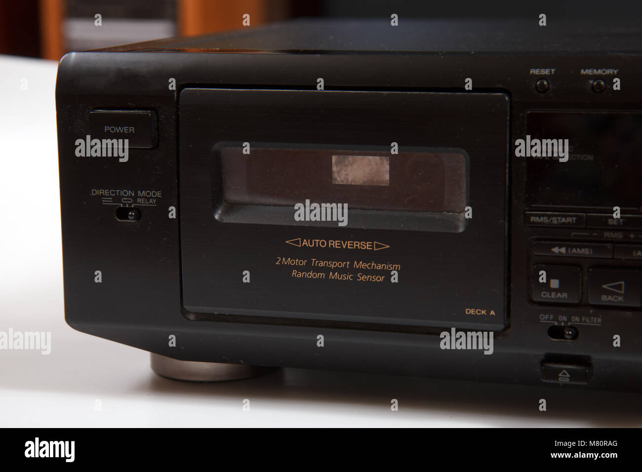 putting cassette on an old cassette player Stock Photo - Alamy