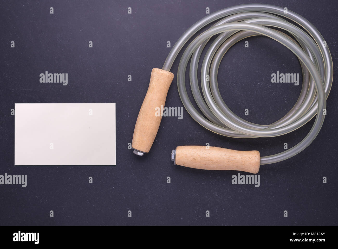 Exercise Concept : Top view skipping rope on black stone table ...