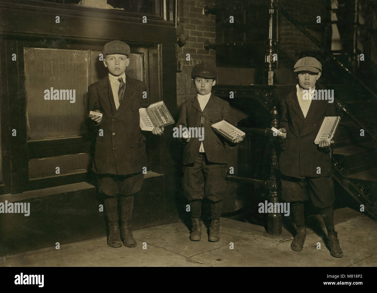 Three Young Boys Selling Gum Near National Theater at Night, Full ...