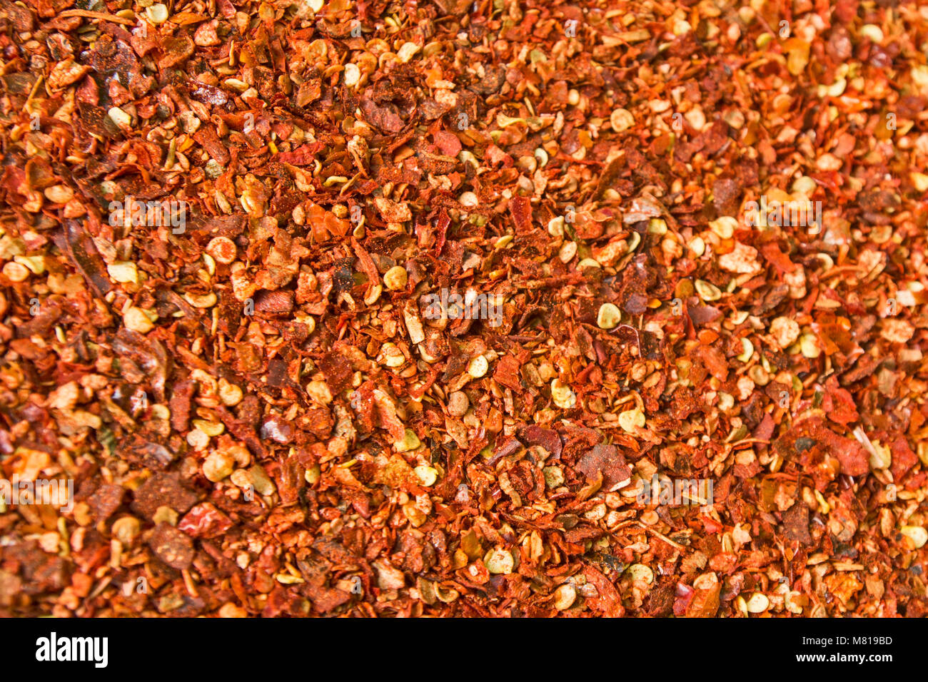 Coarsely minced red pepper exposed for sale Stock Photo - Alamy