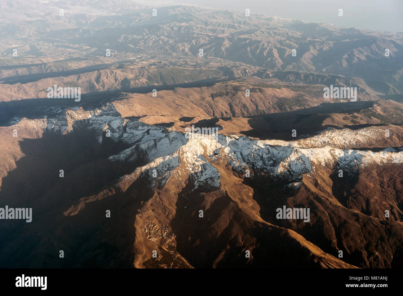 Aerial view of Baetic Cordillera mountains with snow on mountain peak ...