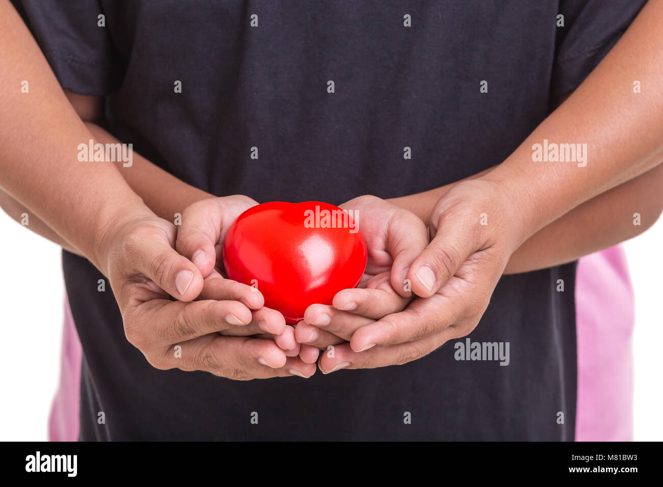 Love mom or love heart concept : Daughter and mother holding red heart ...
