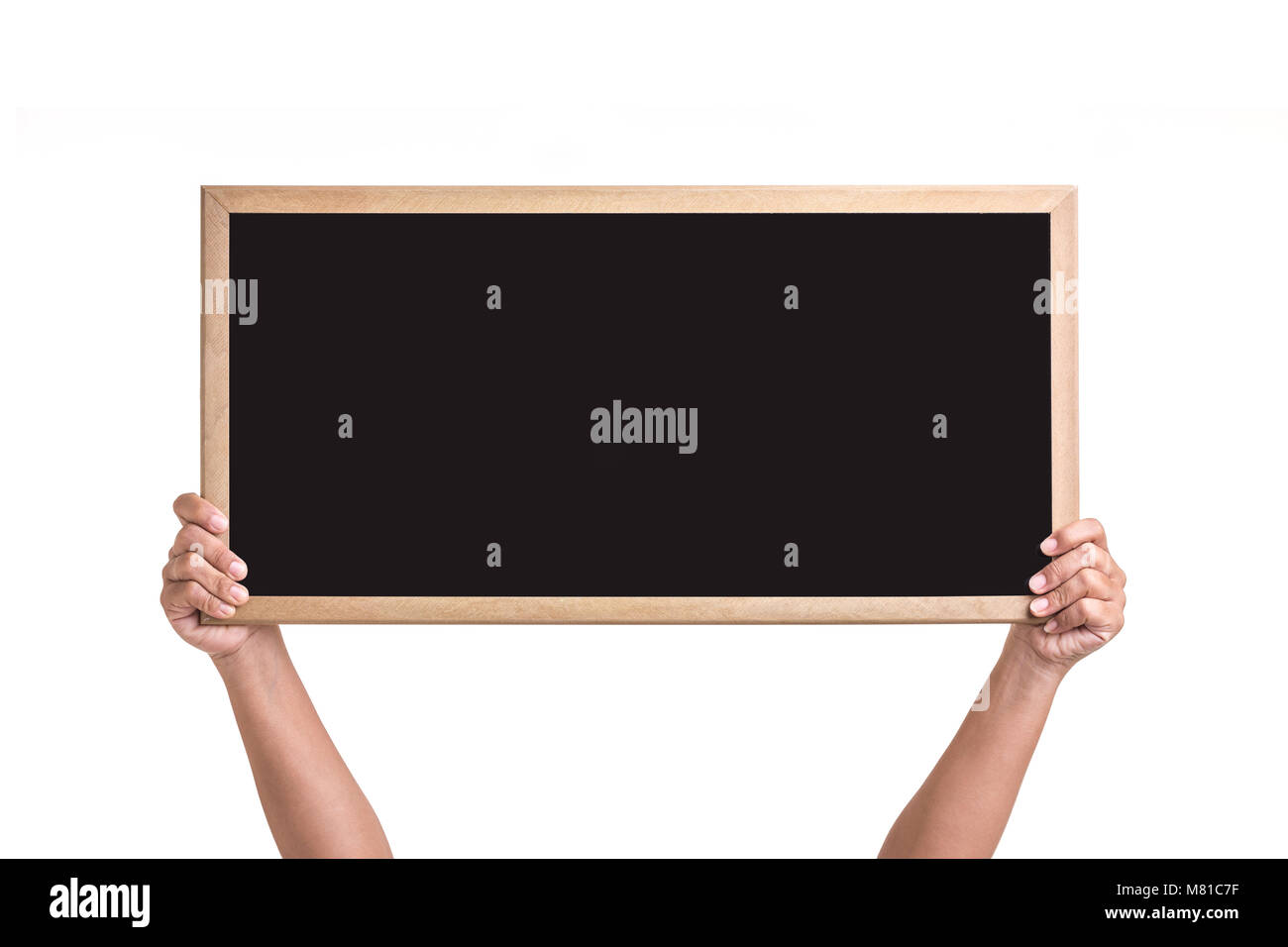 Human hand holding blackboard with wooden frame isolated on white ...