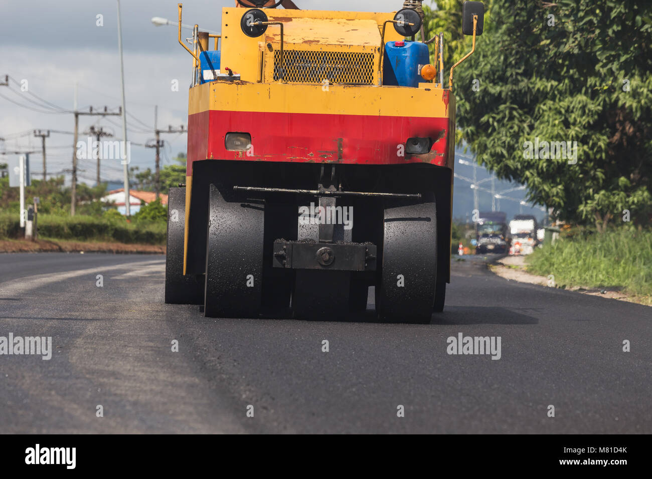 Outdoor working : Road roller working on the new road construction site ...