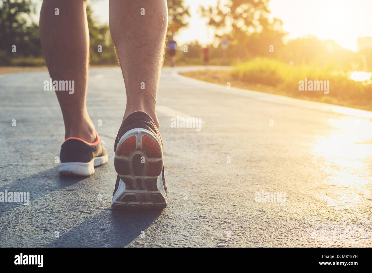 Man workout wellness concept : Close up runner feet with sneaker shoe ...