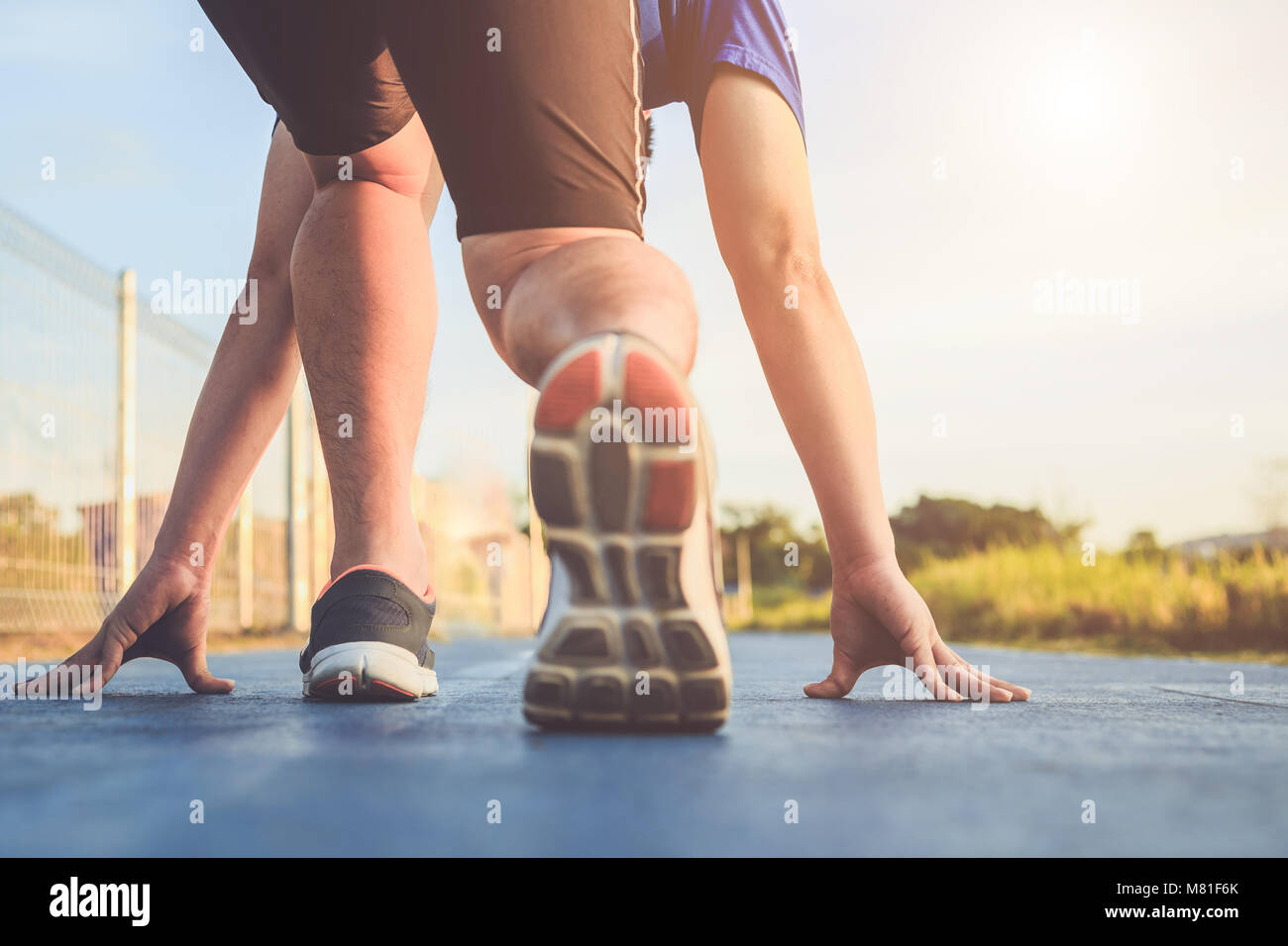 Man workout and wellness concept : Close up runner feet with sneaker ...