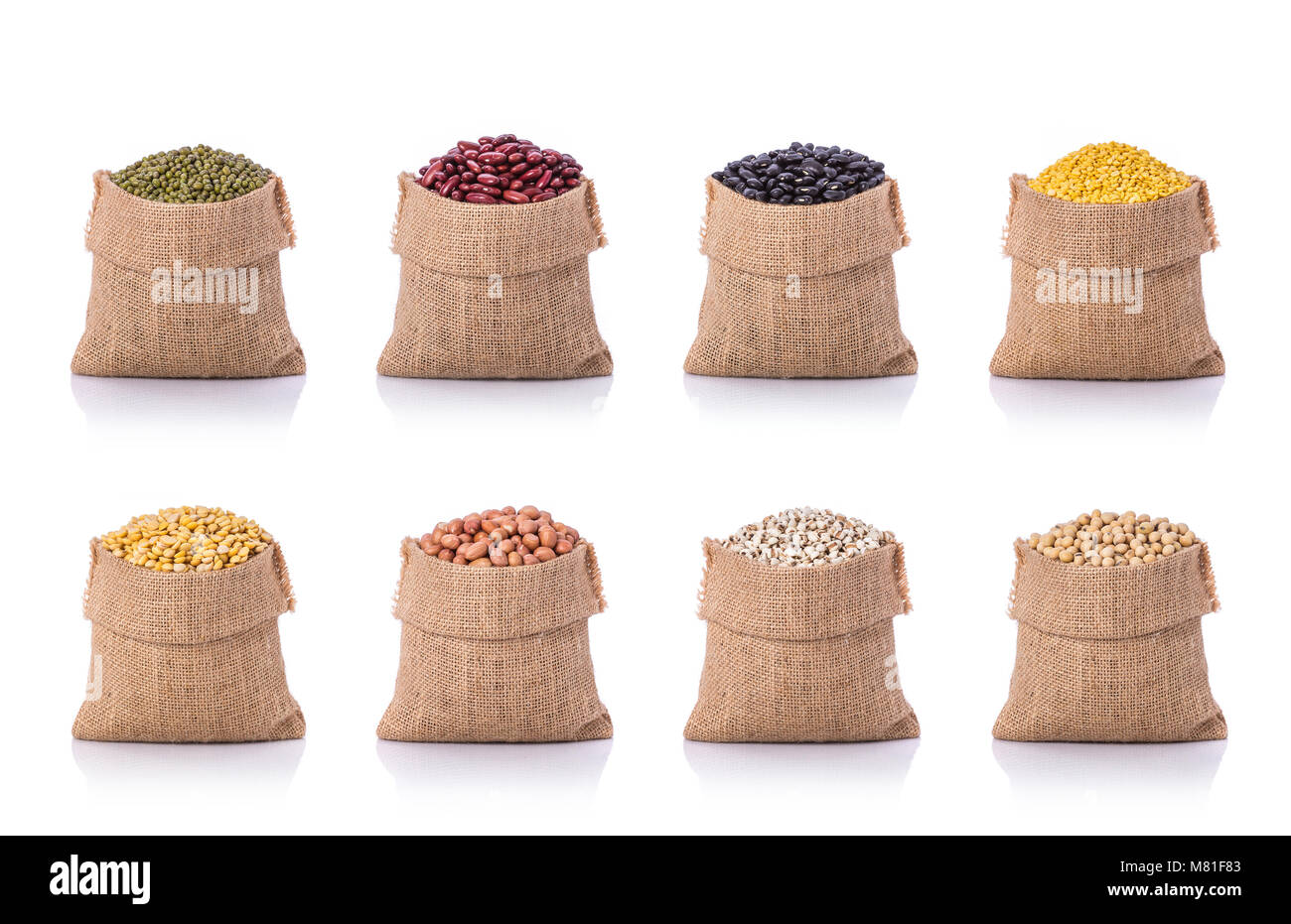 Collection of several beans in brown small sack. Studio shot isolated ...