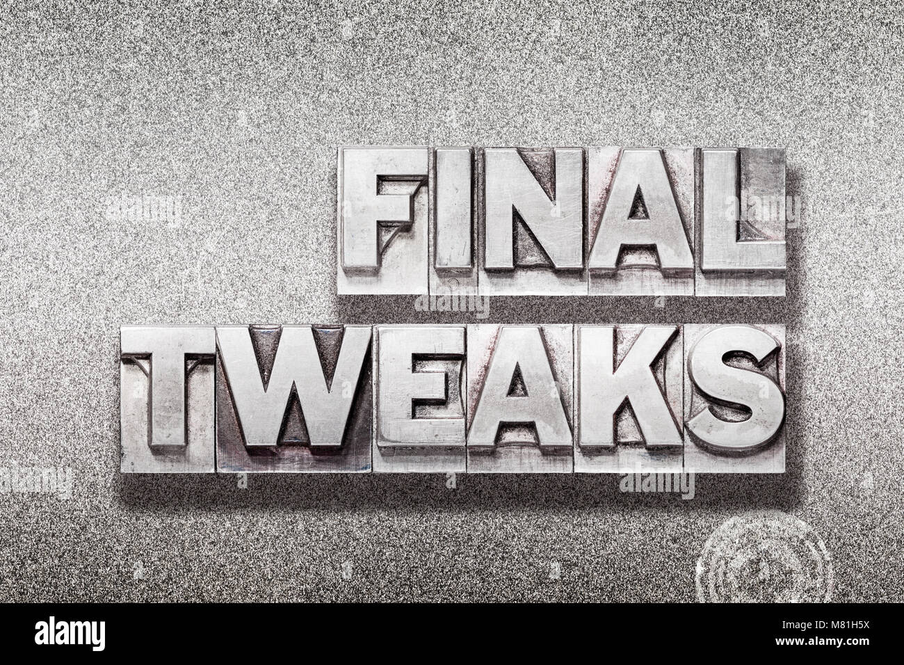 final tweaks phrase made from vintage letterpress on metallic textured ...