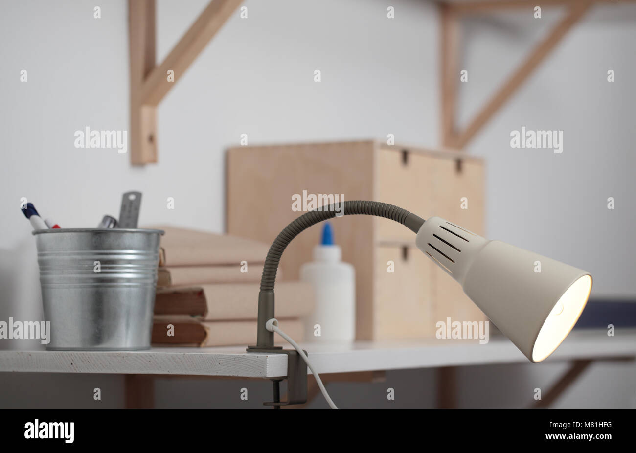 Shelf with accessories and spotlight in a home interior Stock Photo - Alamy