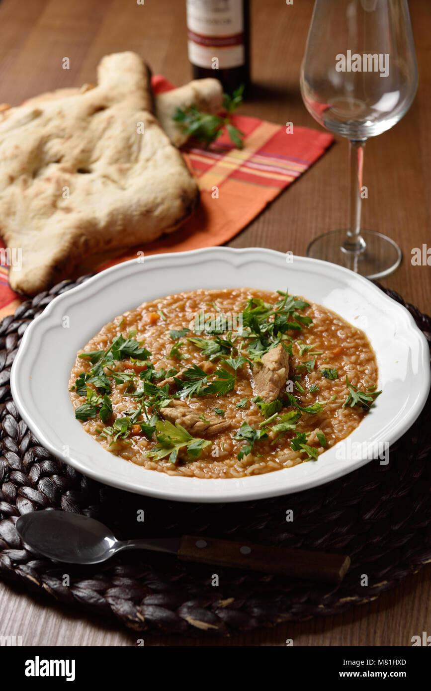 Soup Kharcho, the traditional Georgian soup with meat and rice served ...