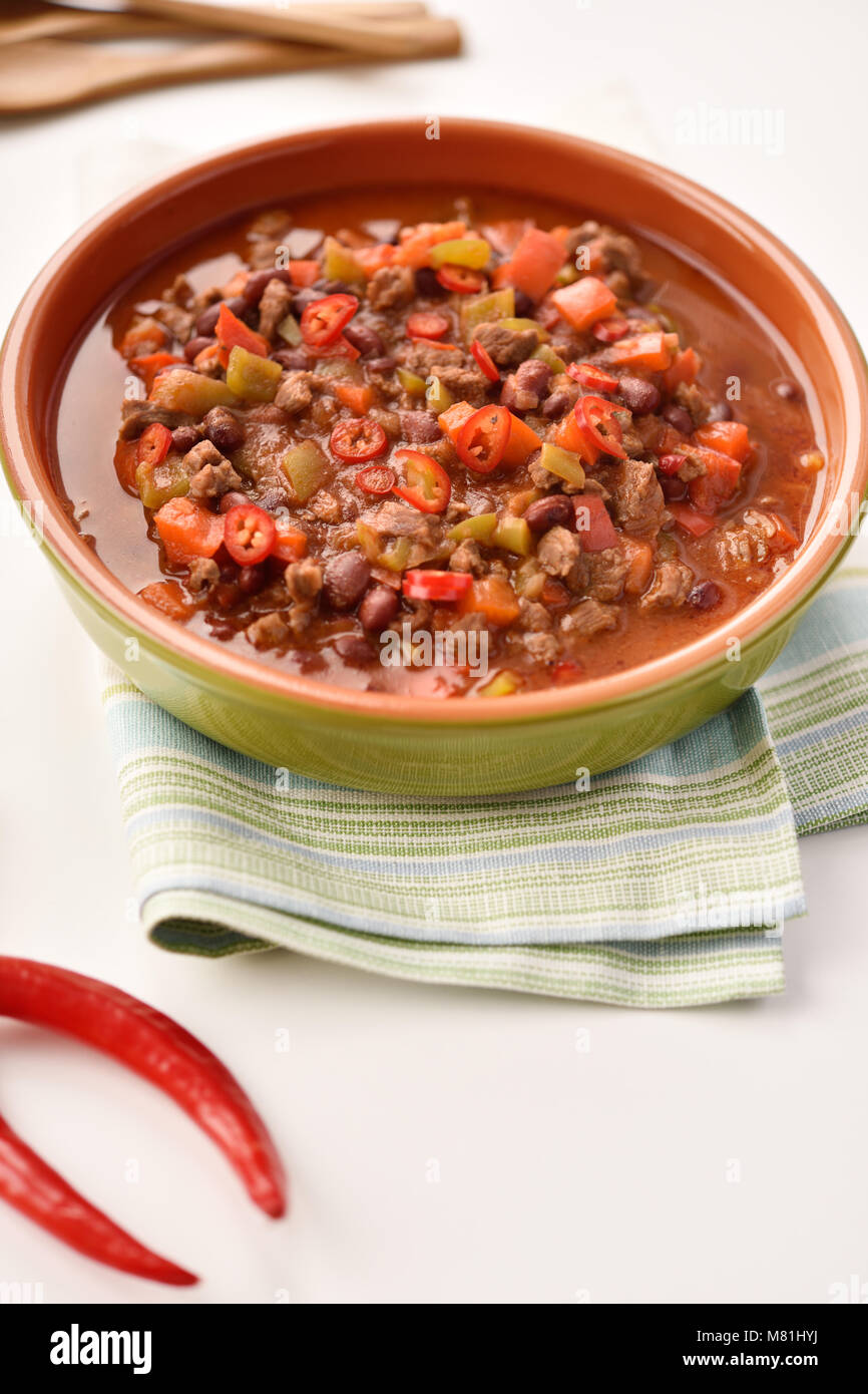 Chili con carne in a rustic bowl Stock Photo - Alamy