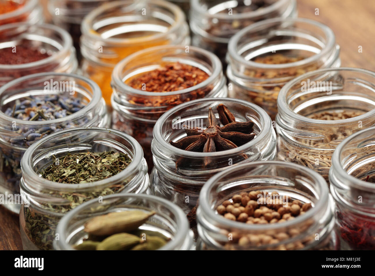 Rows of jars with various spices Stock Photo - Alamy