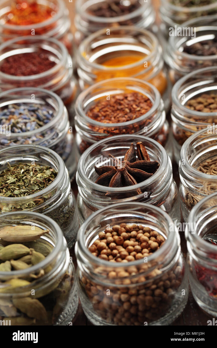 Rows of jars with various spices Stock Photo - Alamy