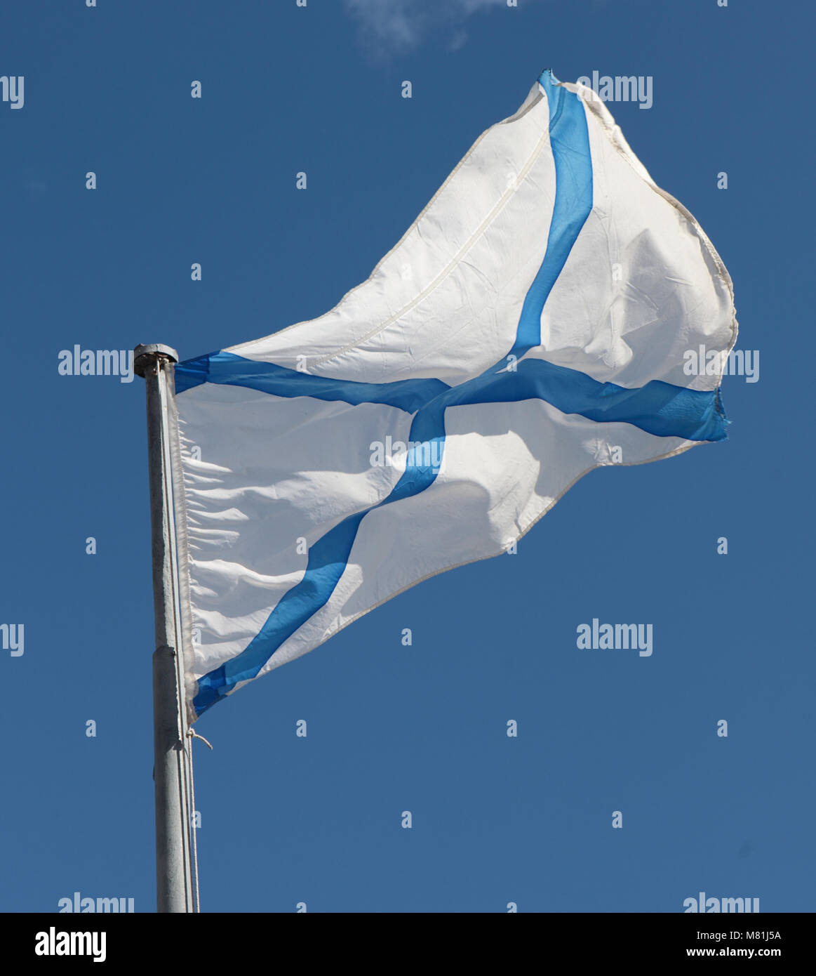 Russian Navy Ensign on a flag stick against blue sky Stock Photo - Alamy