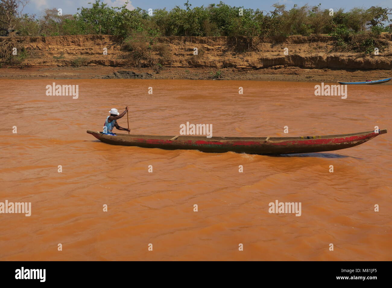 Pirogue, dugout, canoe on Tsiribihina river, Madagascar Stock Photo - Alamy